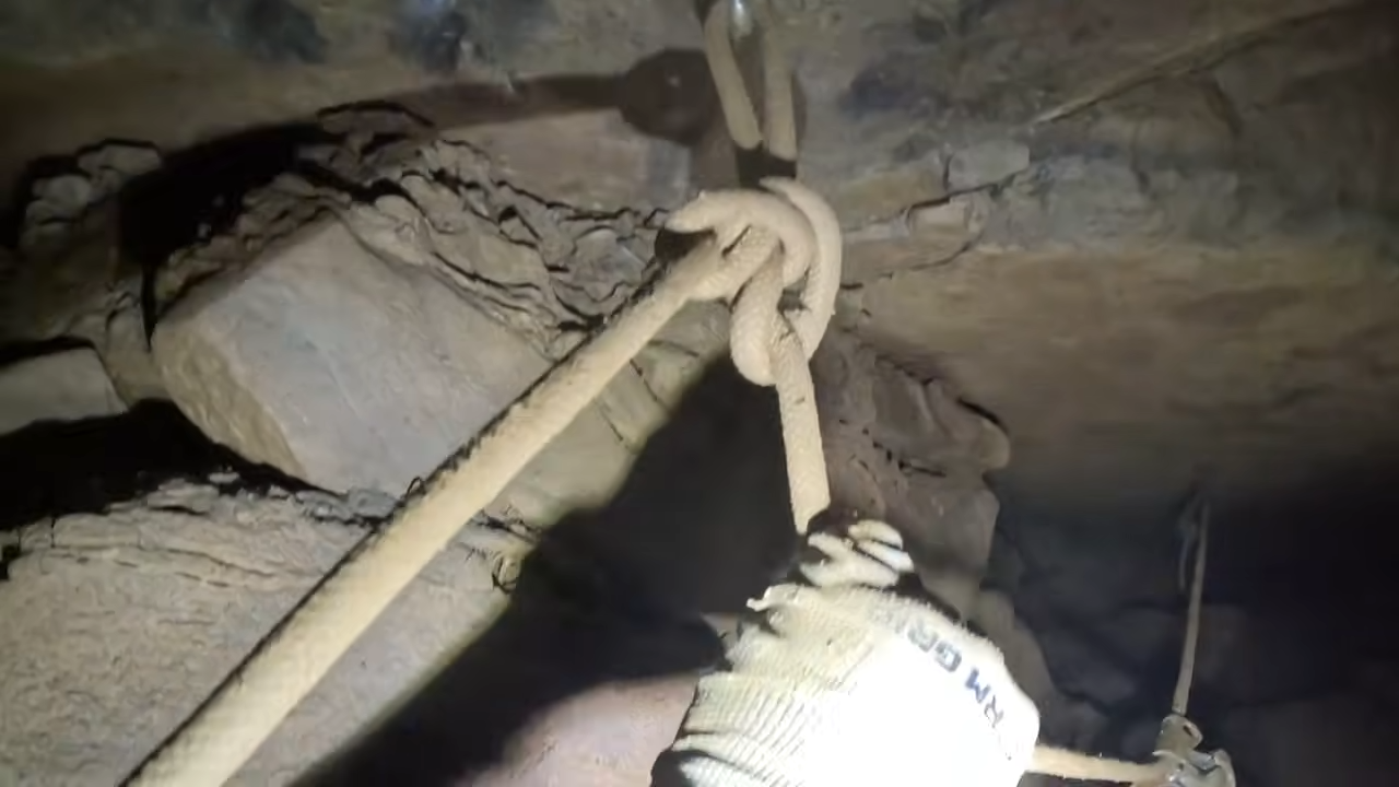 This is the only way up - the 90-foot waterfall climb deep underground