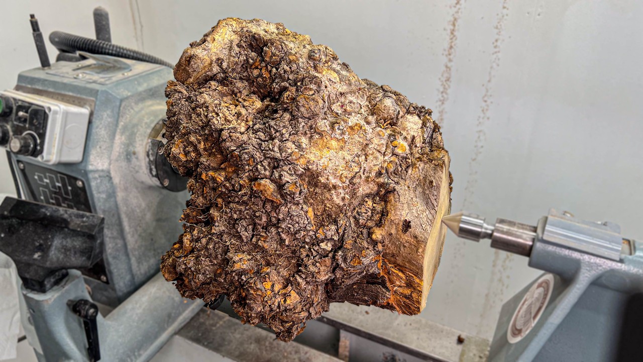 Woodturning masterpiece: Black locust burl vase with green epoxy