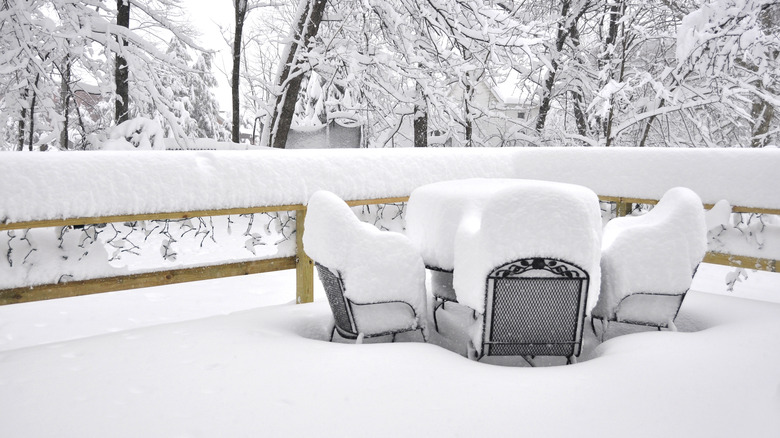 The simple snow shoveling method that'll protect your deck from damage