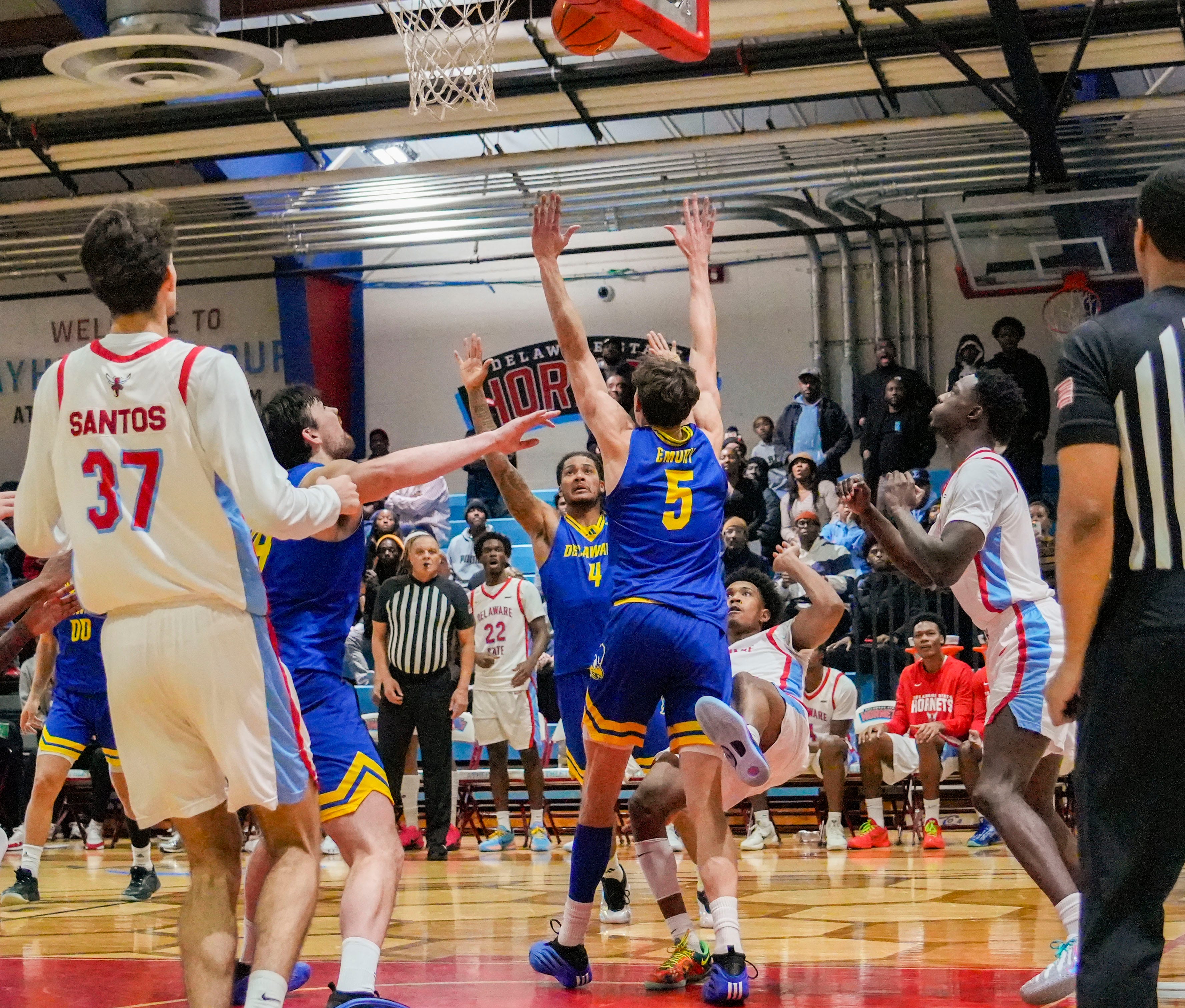 Delaware State works OT for much-needed basketball win over Delaware