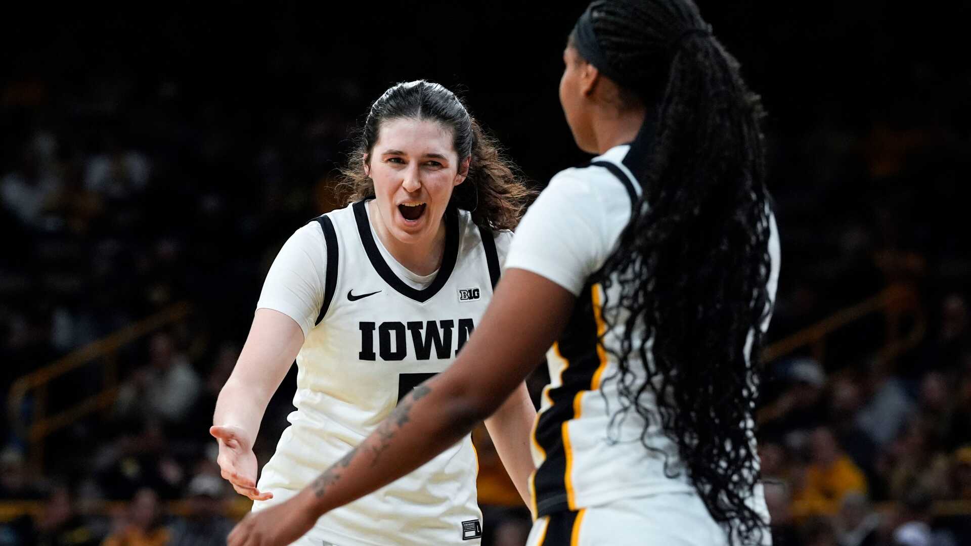 Heiden scores 17, No. 12 Iowa women beat Rutgers 79-36 in Big Ten opener