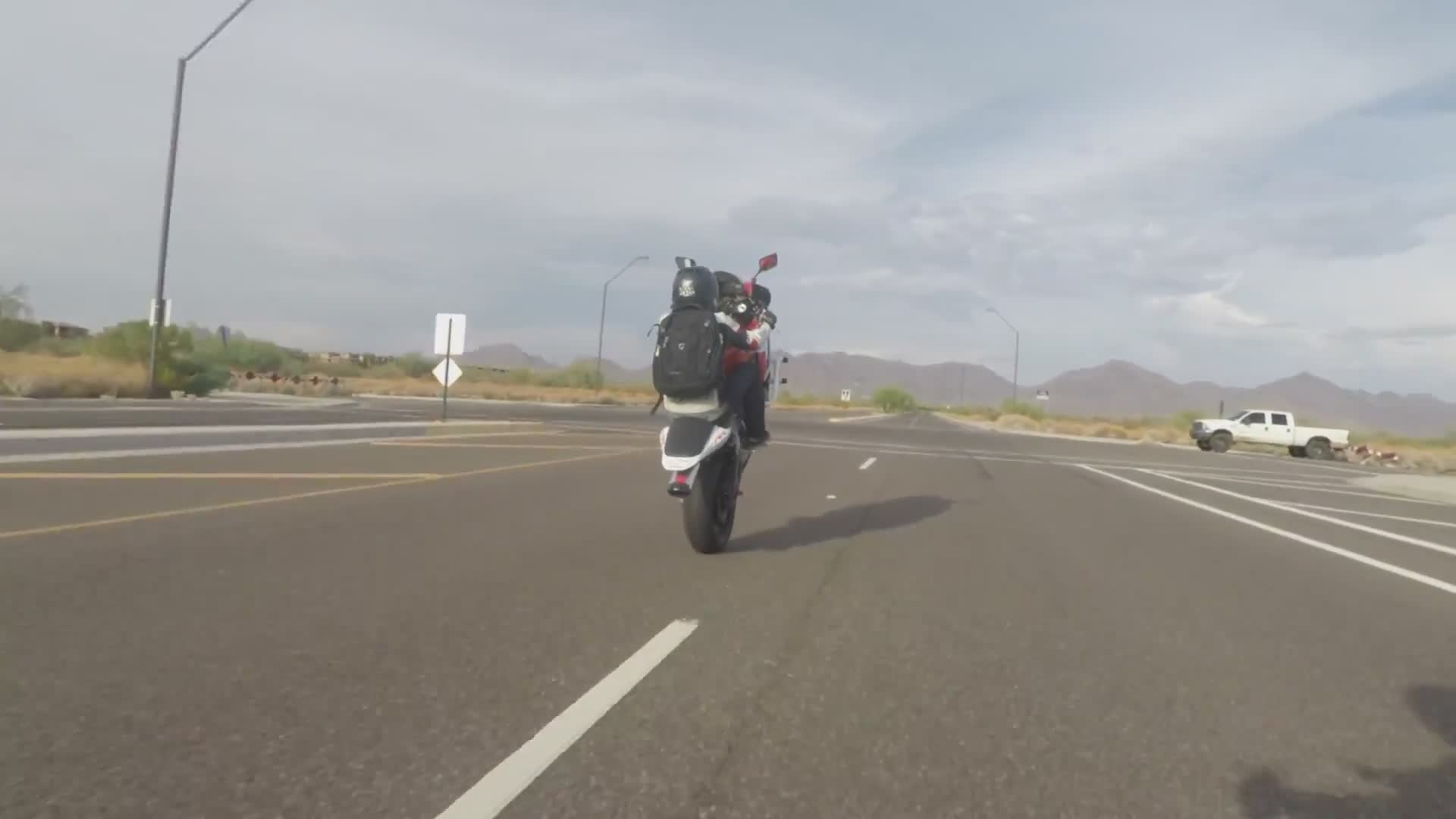 Skilled rider demonstrates impressive wheelie control on middleweight ...