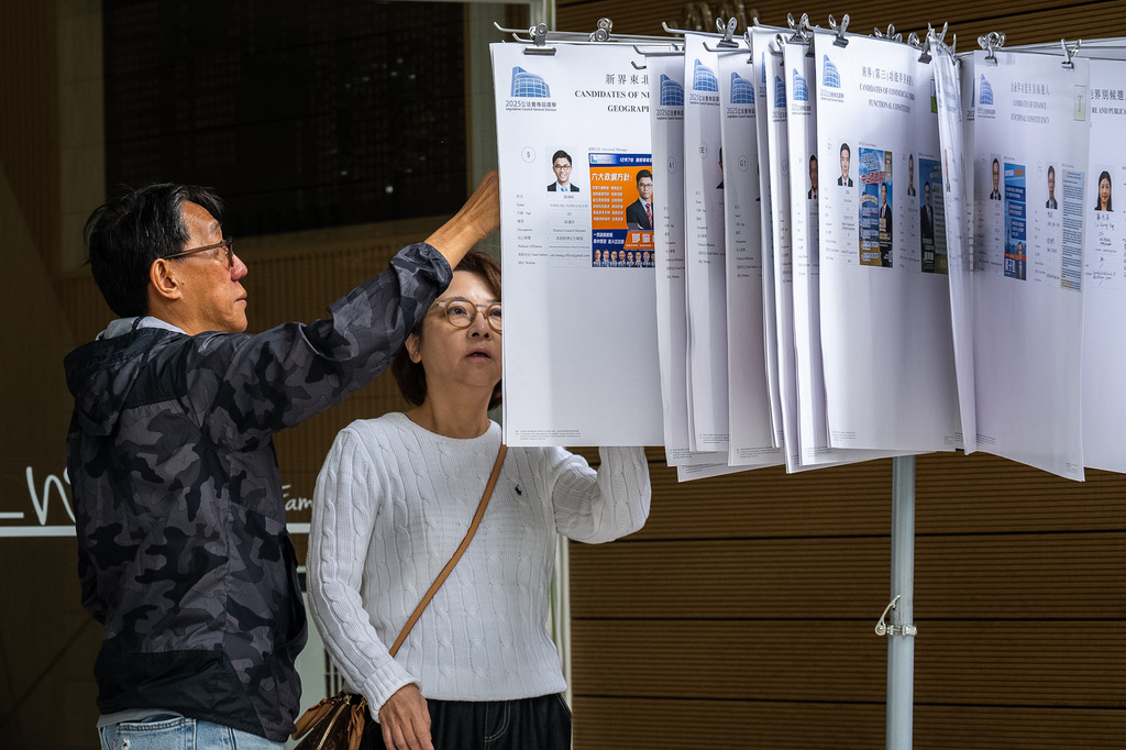 Hong Kong votes in legislative election after deadly fire