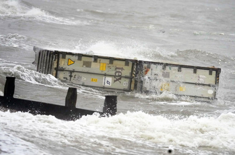 Shipping containers and bananas wash up on Selsey beach in West Sussex ...