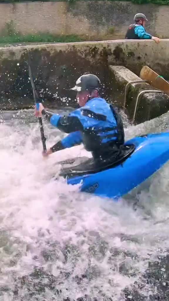 Kayak flip challenge in intense rapids