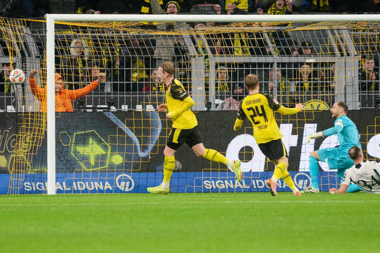Dortmund beats Hoffenheim 2-0 to cement third spot in Bundesliga