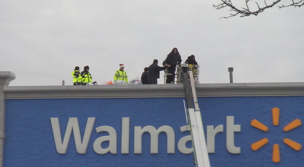 Police go onto Walmart roof in Chicopee for Special Olympics donations