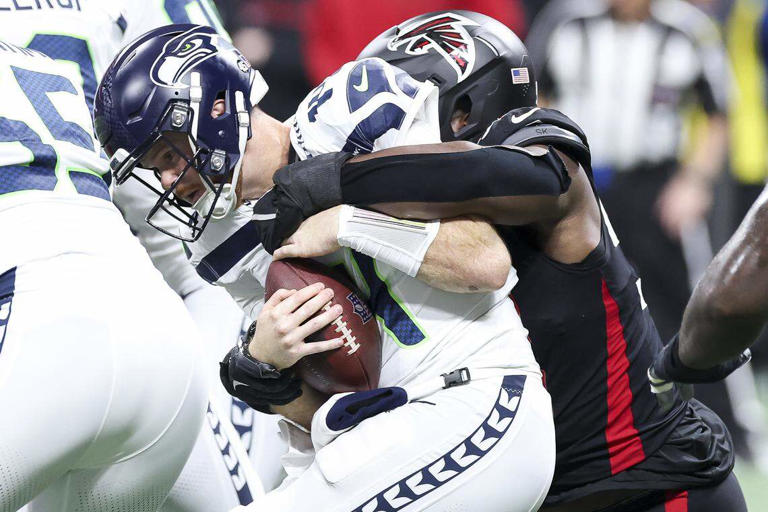 Devon Witherpsoon, Nick Emmanwori, roaring Seahawks defense rout Falcons