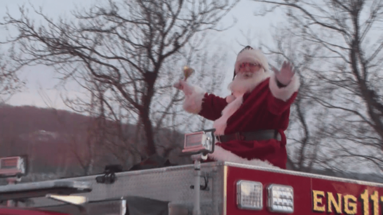 Santa makes surprise appearance in festive parade