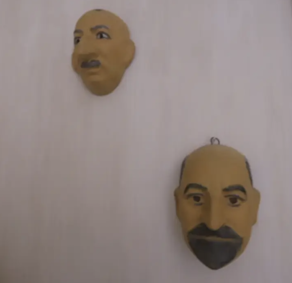 Forensic expert identifies some of 11 terrifying masks on wall in ...