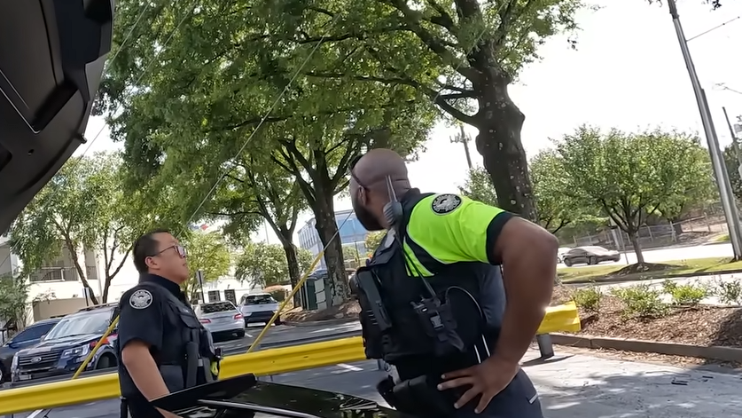 I'll sue if you tow it! - Towtrucker watches as officer refuses to back ...
