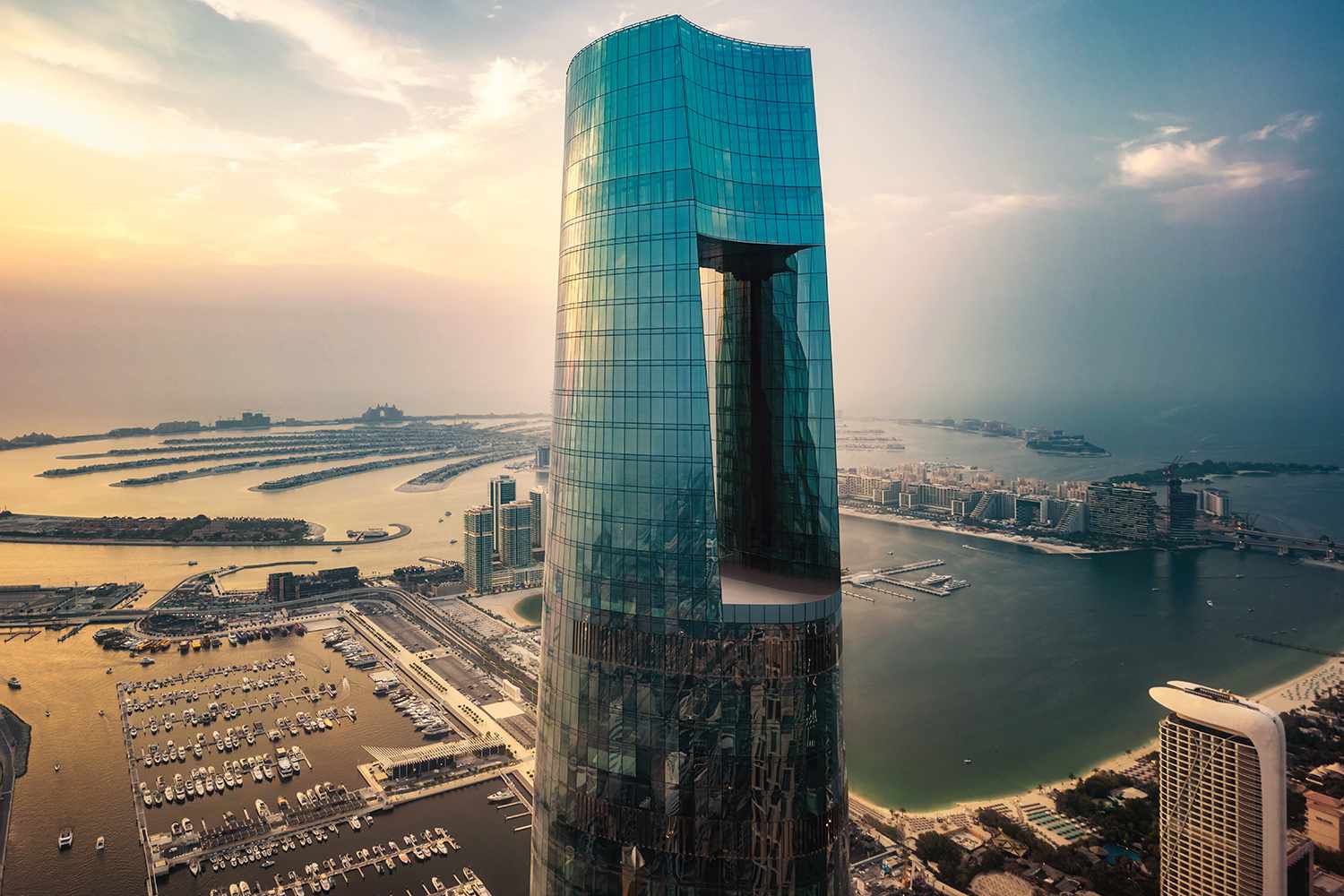 Skydivers fly through world’s tallest hotel at speeds of over 124 mph ...