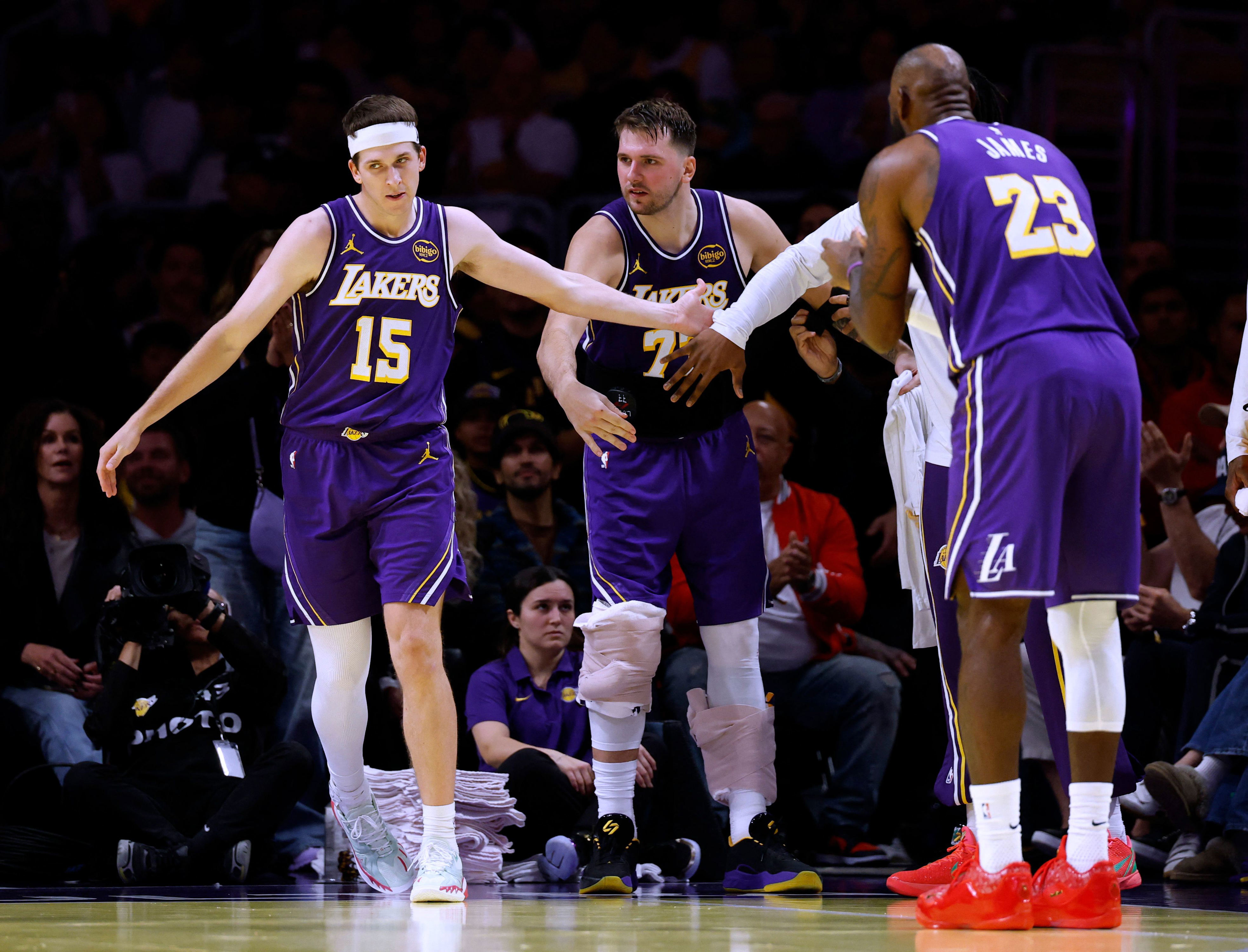 NBA: James and Doncic lead Lakers over Sixers; Thunder win 15th straight