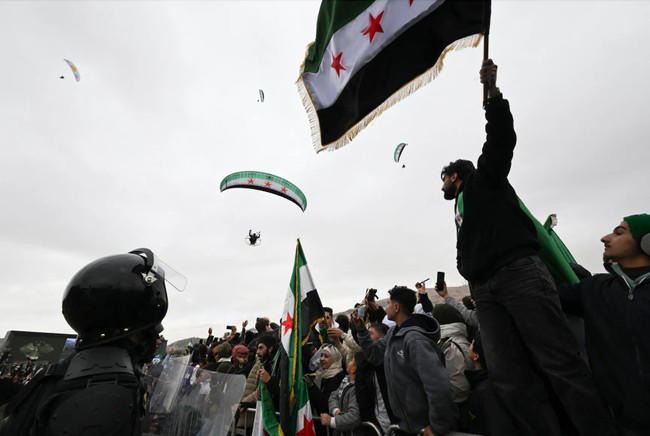 In pictures: Tens of thousands celebrate as Syria marks one year since ...