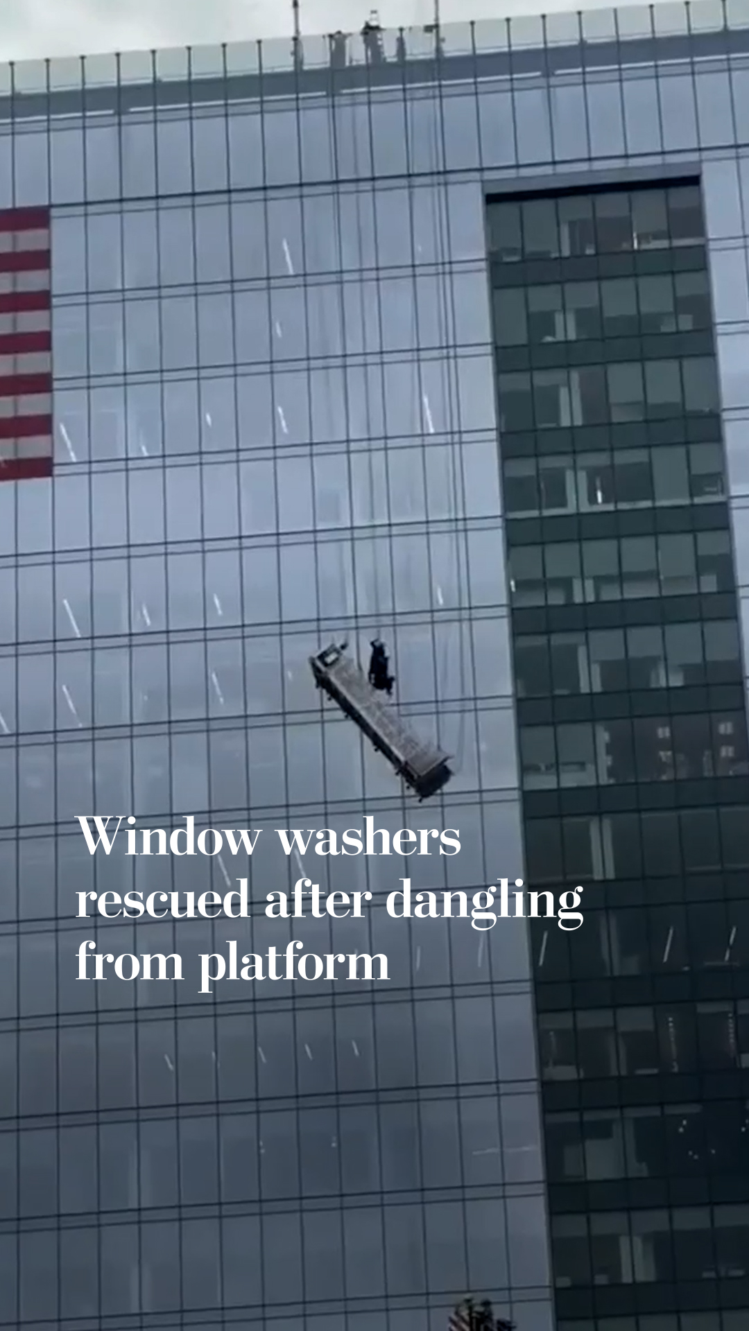 Window washers rescued after dangling from platform