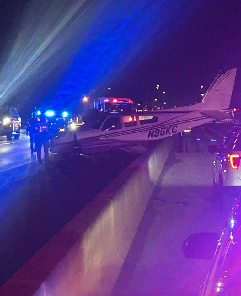 Small plane with two on board lands along I-95 in Cocoa, Florida