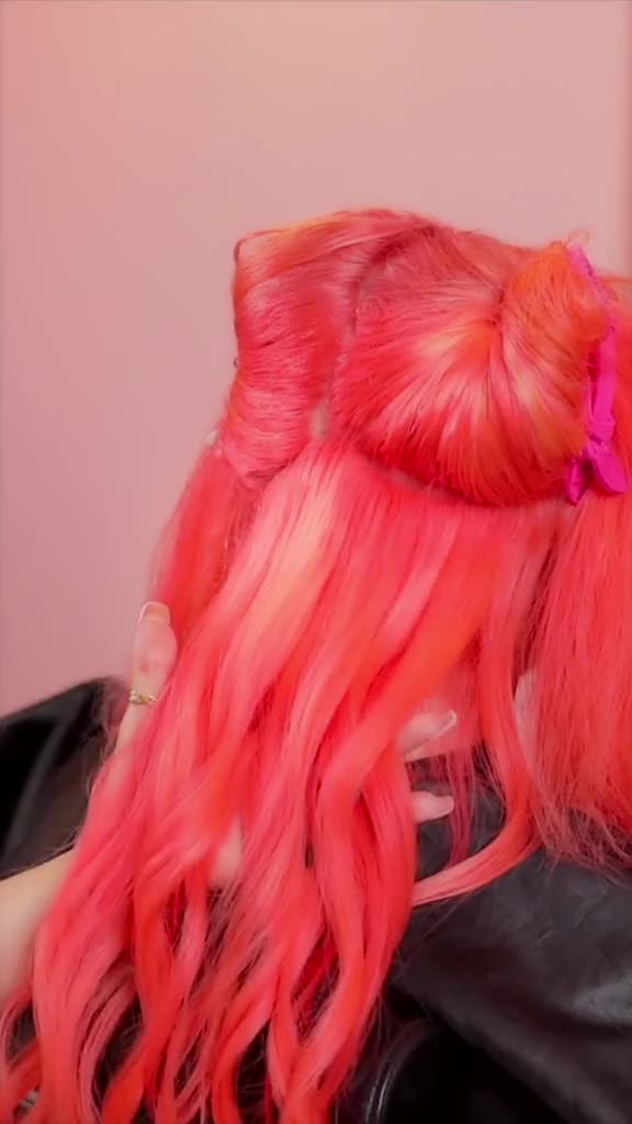 Get soft mermaid waves with vibrant coral hair