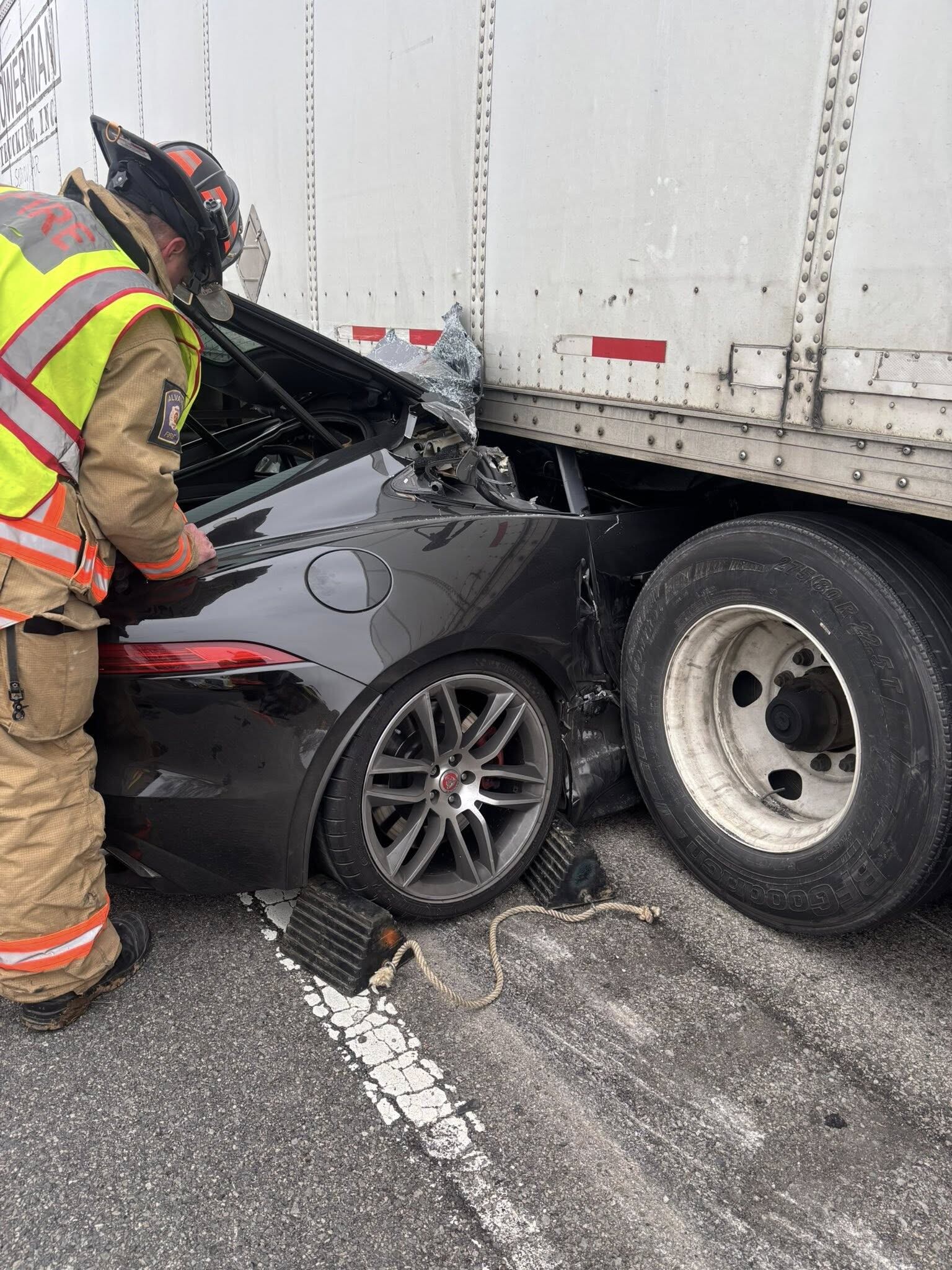 Car pinned under semi-truck in southern Kentucky crash on I-65