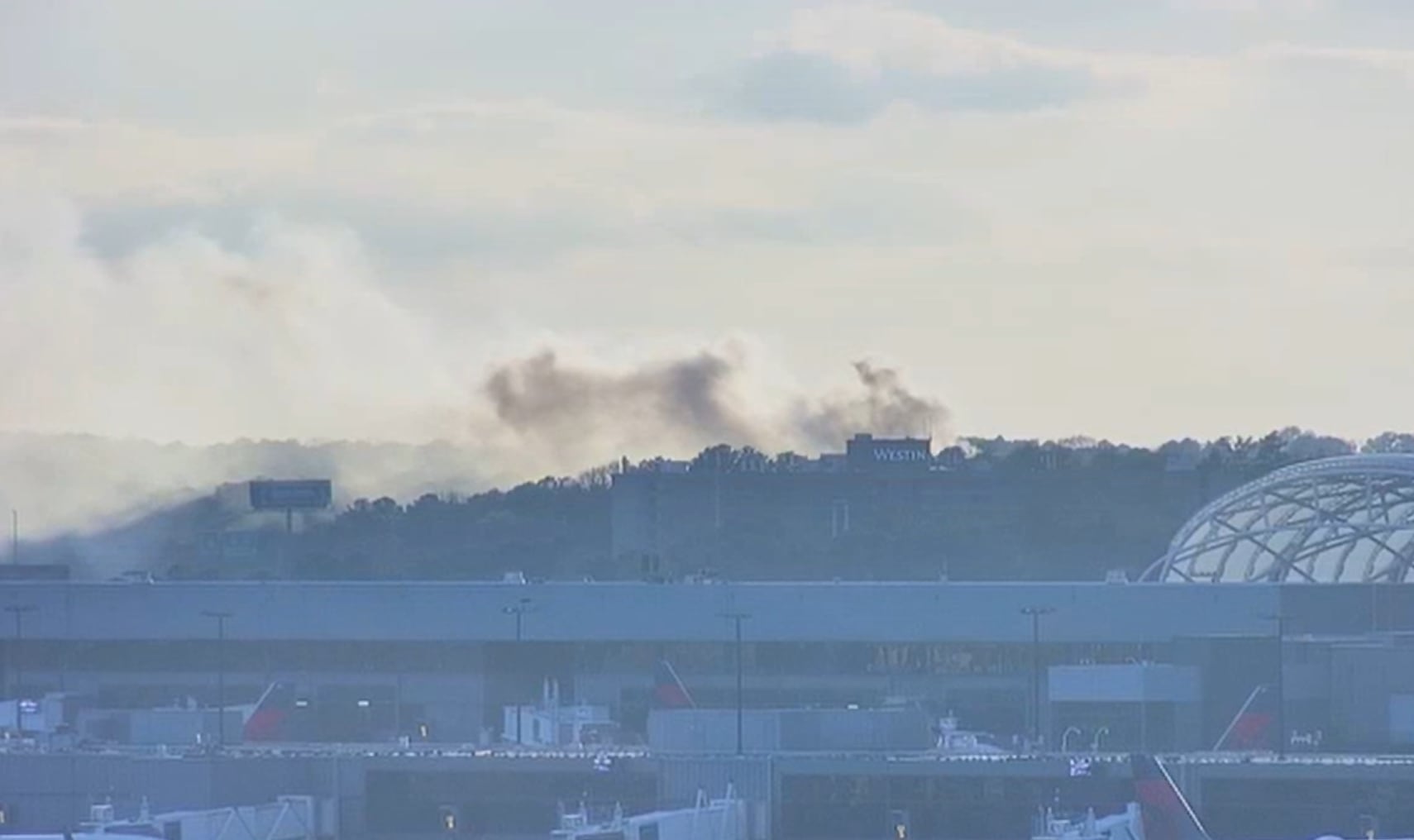Crews battle large apartment fire near Atlanta airport, entire building ...