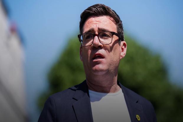 Andy Burnham pledges crackdown on 'dodgy shops' in by-election bid