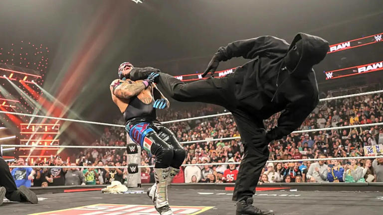 Who is the mystery masked man helping the Vision in WWE? Why Austin ...