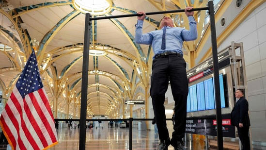 Robert F Kennedy Jr, 71, shocks Reagan Airport crowd with 20 pull-ups