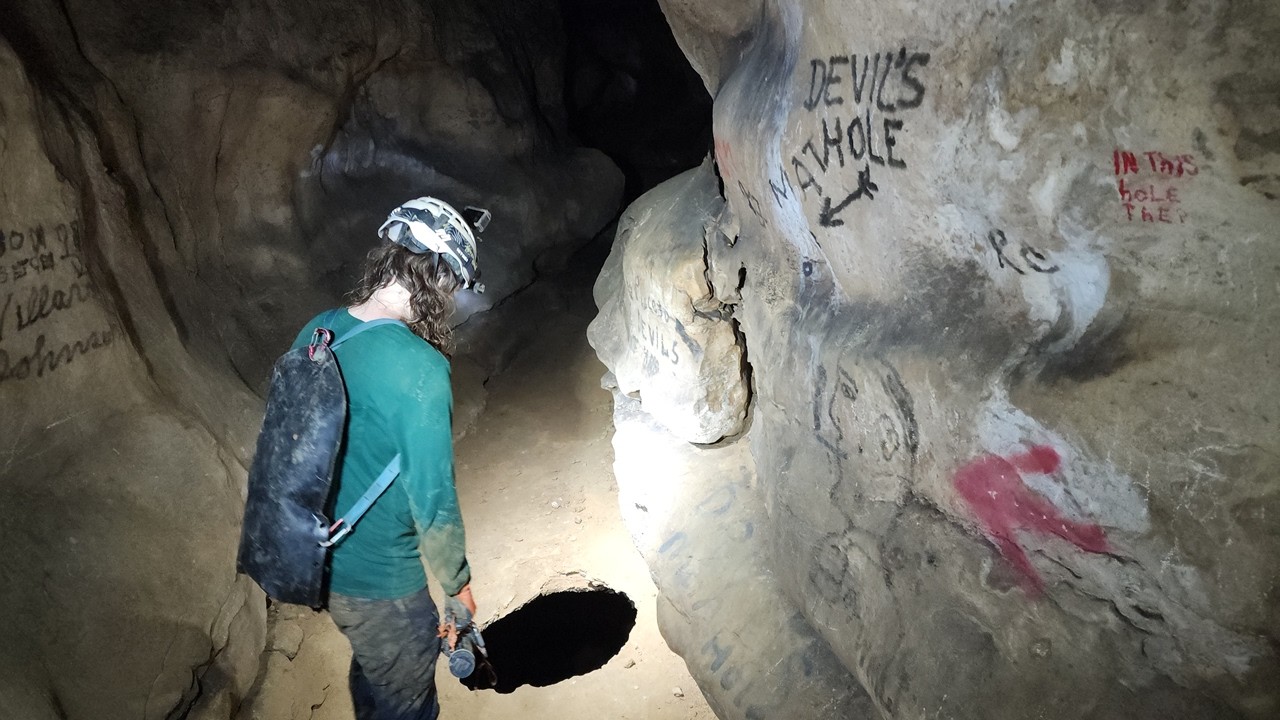 What happens when you enter Devil’s Hole and the darkness feels alive