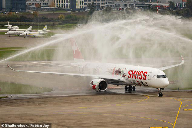 The bizarre reason why planes get sprayed by water before taking off