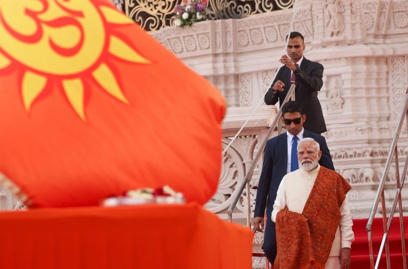 No rope, no remote! PM Modi hoists Ram Mandir flag with a never-seen ...
