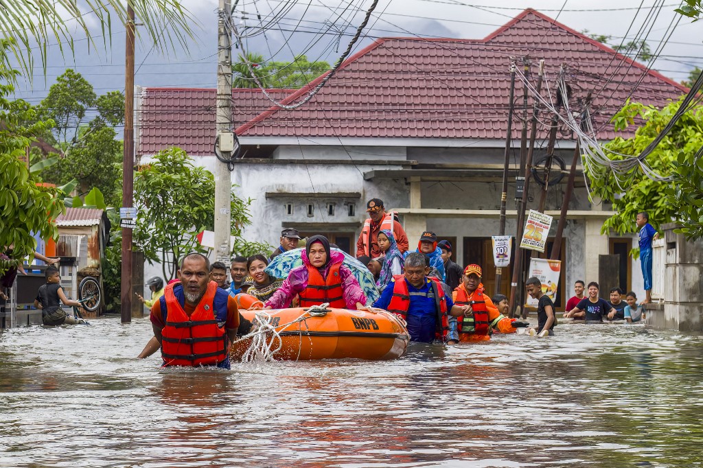 At least 10 people killed in Indonesia floods, landslides