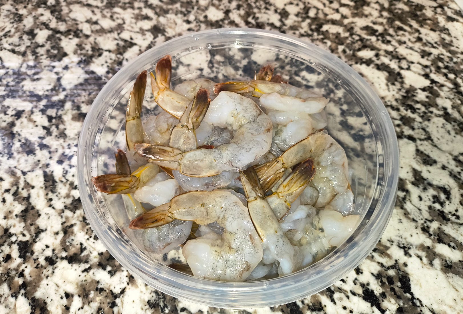 I tried Ina Garten's simple baked shrimp scampi. The dish came together ...