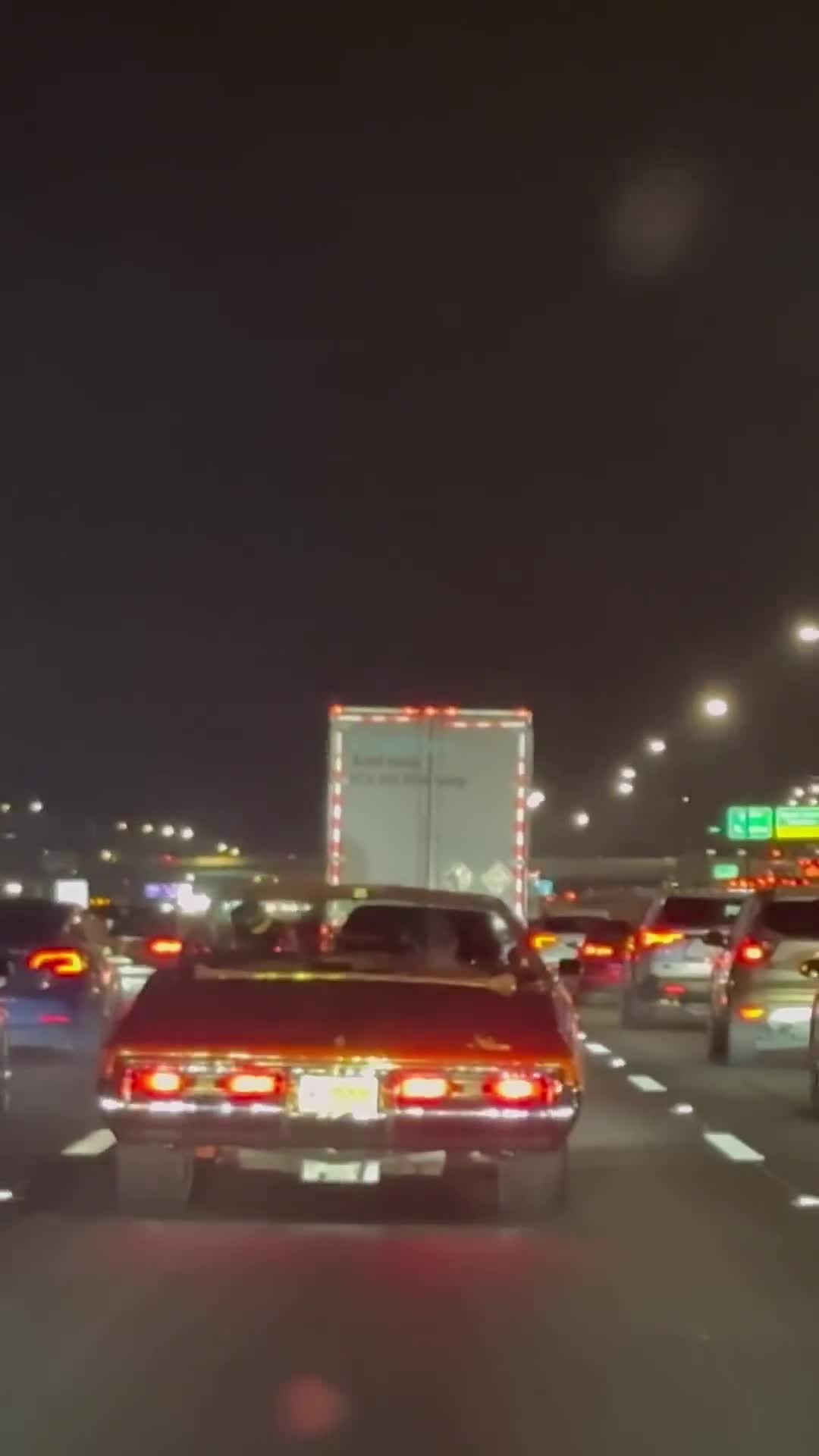 Bro vibing in his Chevy vert in traffic