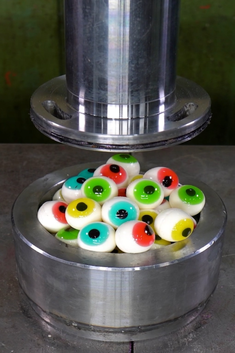 Colorful Objects Under Hydraulic Press