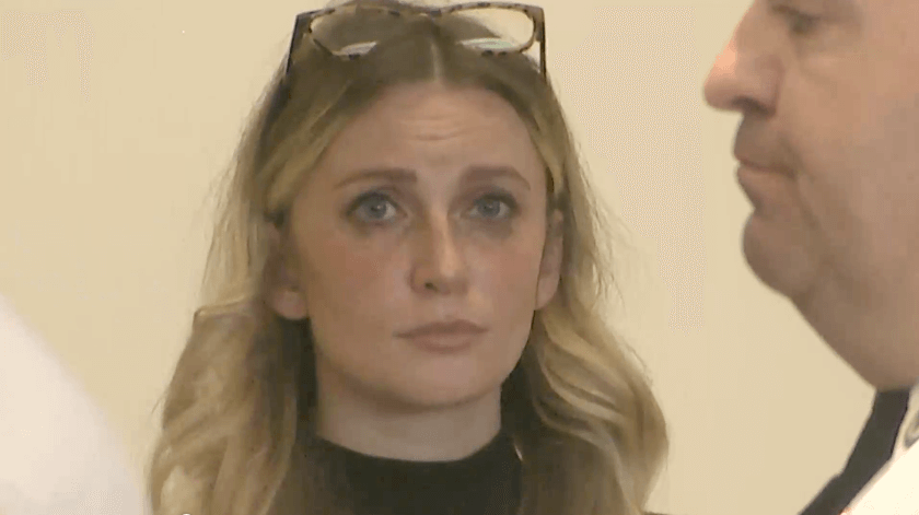 Police officer held without bond in custody battle assault case