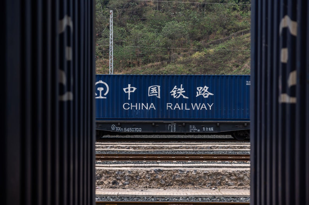 At least 11 dead after train crashes into workers in China