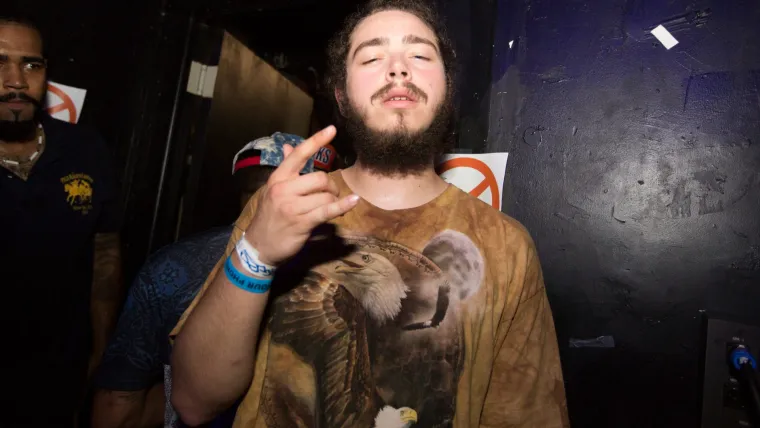 Post Malone's face tattoos, explained: The meanings behind singer's ...