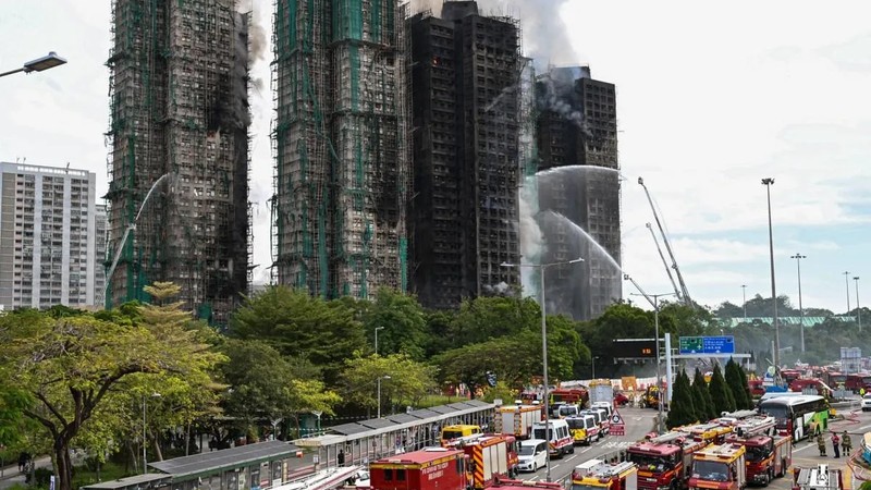 GRAPHIC: Many dead and missing in Hong Kong multiple tower block inferno