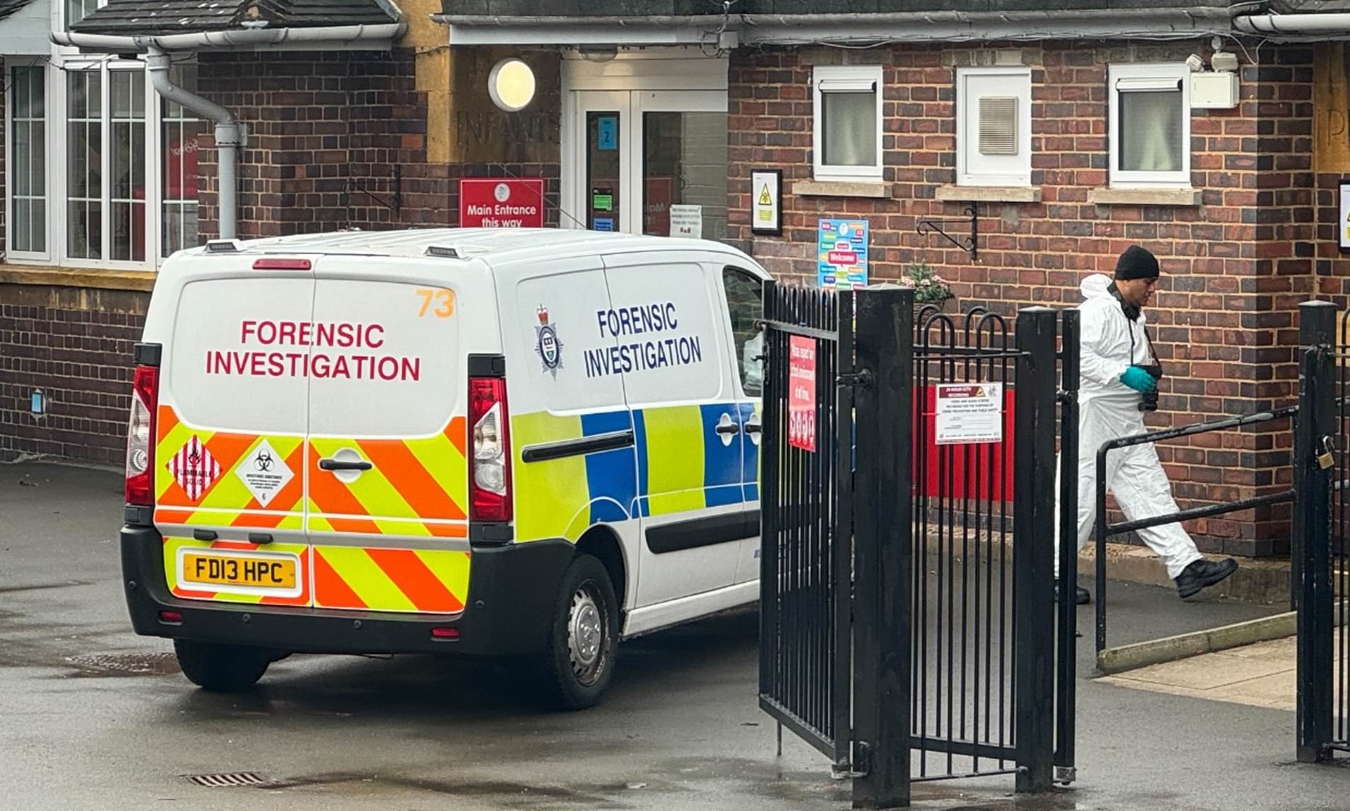 Man's body is found in grounds of primary school as police launch ...