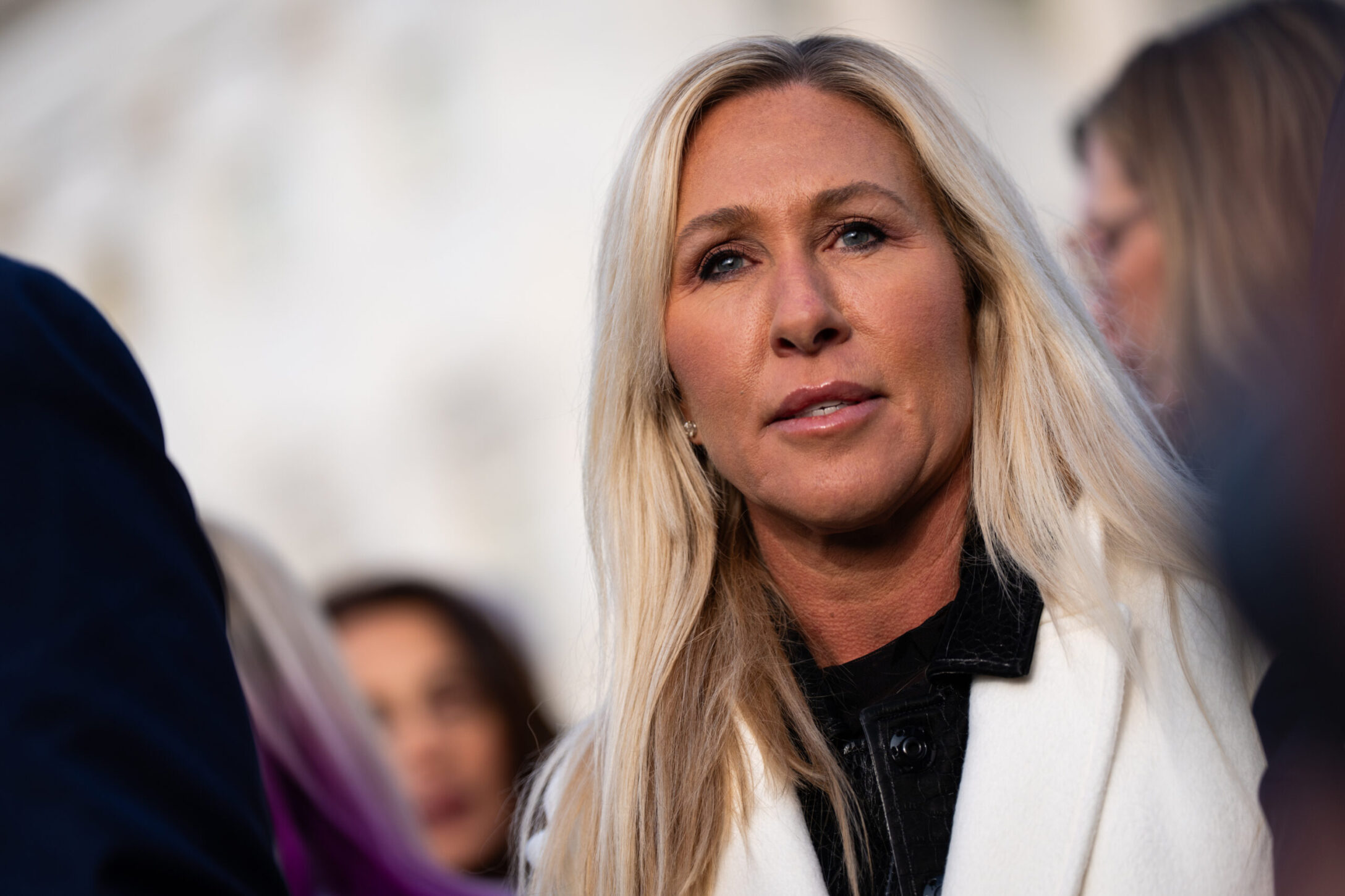 Marjorie Taylor Greene urges people to ‘take off their political ...