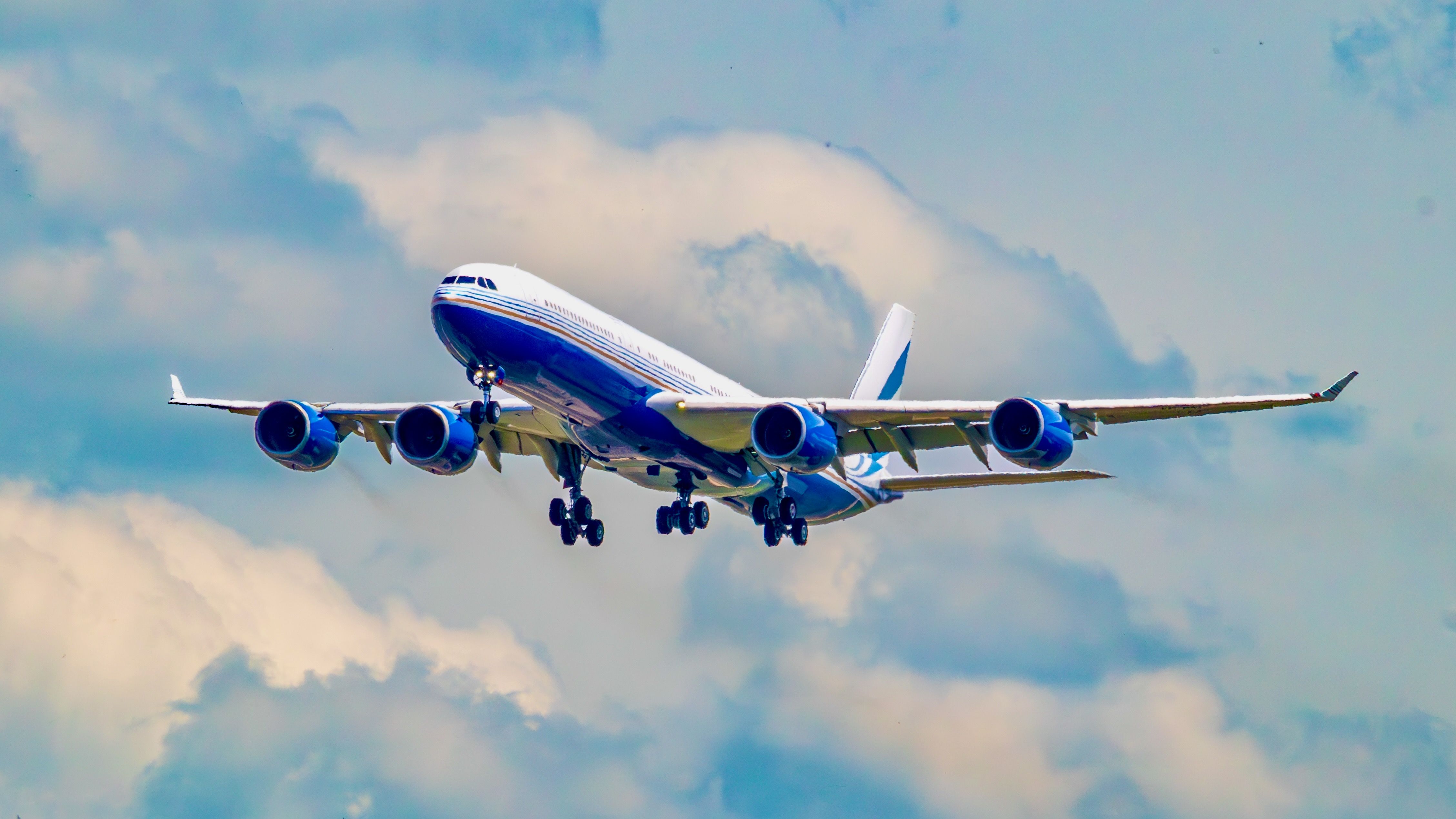 Why did Airbus build the A340 with 4 engines?
