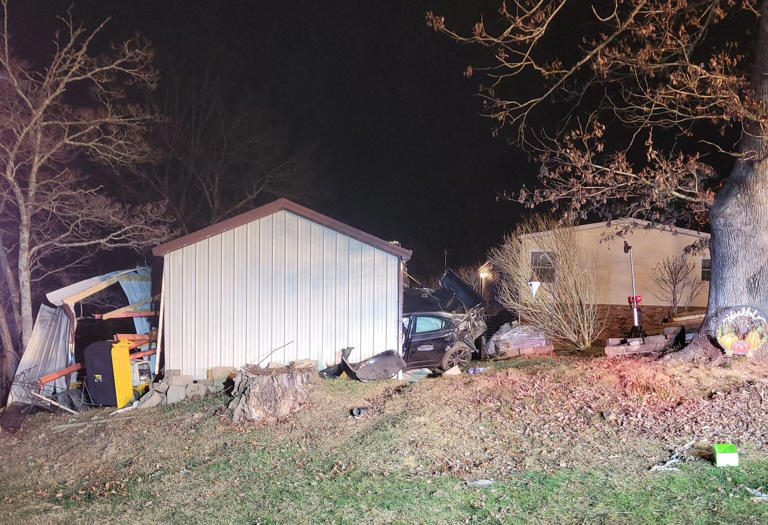 Two people trapped, injured after vehicle hits Grayson County outbuilding