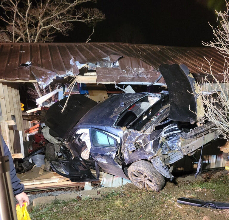 Two people trapped, injured after vehicle hits Grayson County outbuilding