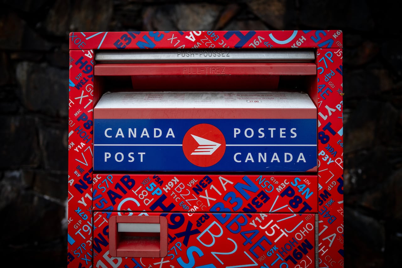 Can Canadians still trust Canada Post with holiday mail after months of ...