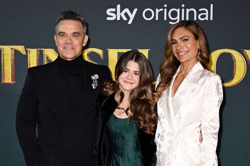 Robbie Williams 'very proud' as he hits red carpet with rarely-seen ...