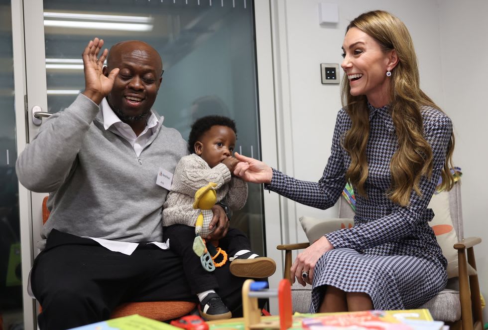 Baby hangs onto Princess Kate's finger in heartwarming moment