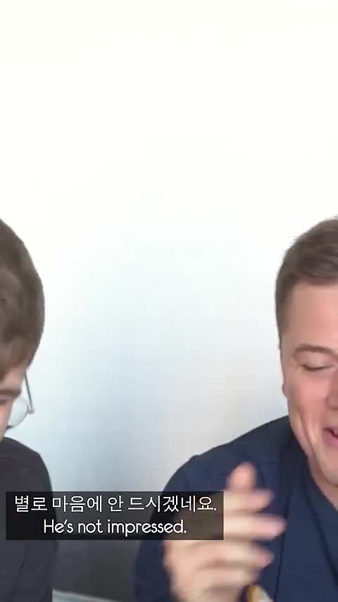 Taron Egerton & Stanley Tucci try Korean fried chicken for the first ...