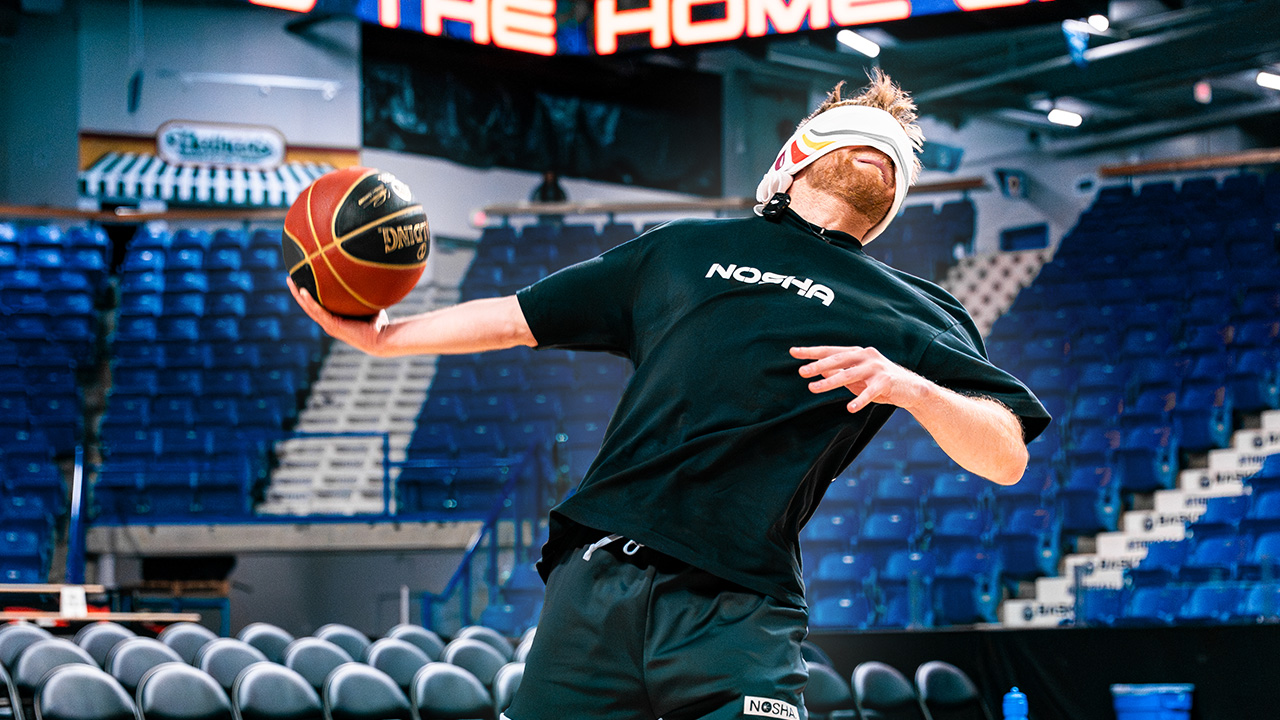 Longest basketball shot blindfolded - 22.51 metres (73 ft 10.2 in) by ...