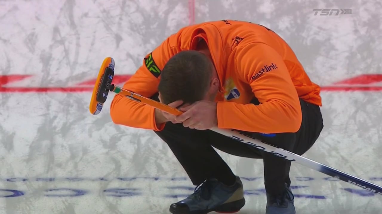 Brad Gushue reacts to a missed shot at Olympic trials