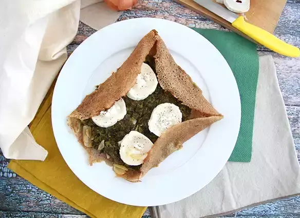 Buckwheat galette with spinach, ham, and goat cheese