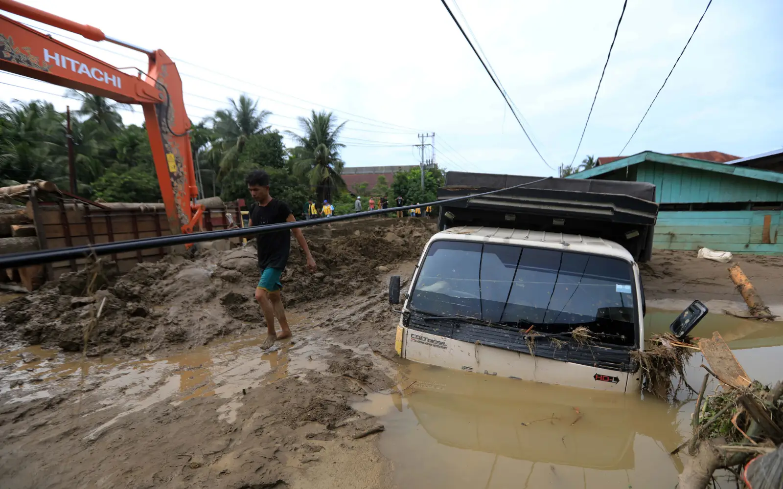 Indonesia’s flood death toll climbs to 303 amid cyclone devastation